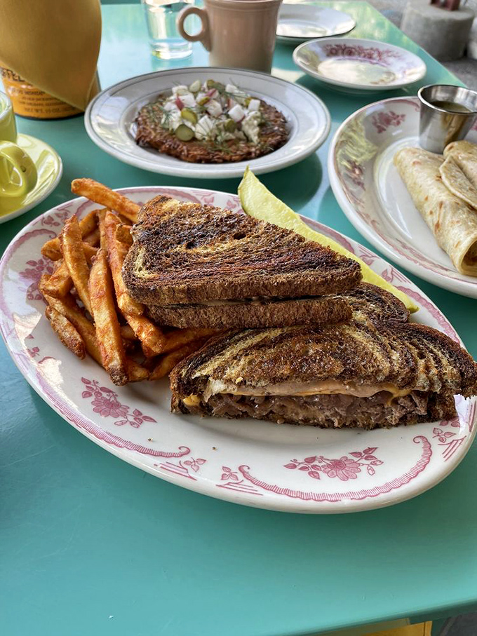 This isn't your midnight diner patty melt—it's patty melt enlightenment. That sunny-side egg crowns the sandwich like a delicious halo.