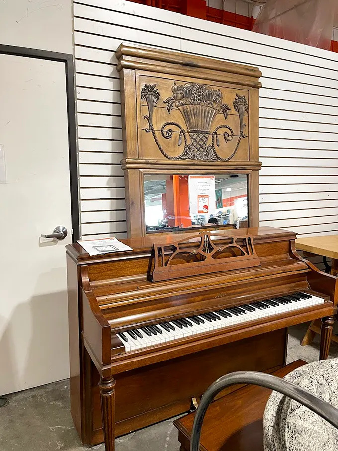 This ornate piano isn't just furniture—it's a conversation piece with stories to tell and possibly the soundtrack to someone's childhood recitals.