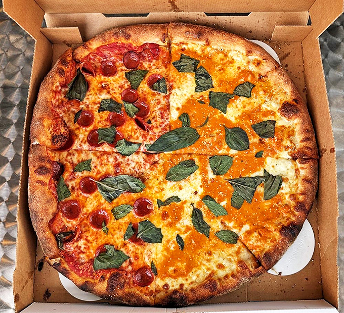 Golden bubbles and perfect cheese pulls prove that pizza artistry doesn't require a Manhattan zip code.