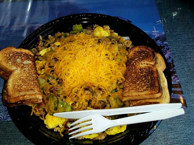 Breakfast platters arrive like edible sunrises, with golden cheese melting into scrambled eggs alongside perfectly toasted bread—fuel for your own day's journey.