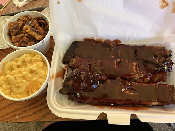 These glistening pork ribs don't just fall off the bone – they practically leap onto your fork, begging to be devoured.