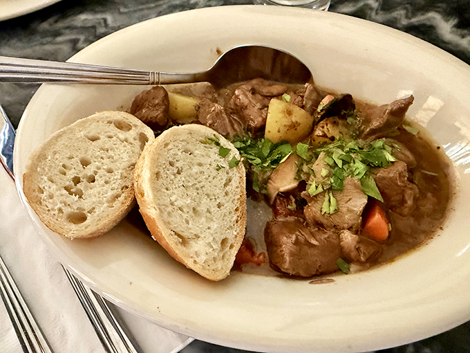 This isn't your grandmother's pot roast—unless your grandmother studied at Le Cordon Bleu. Fork-tender beef swimming in a gravy worth bottling.