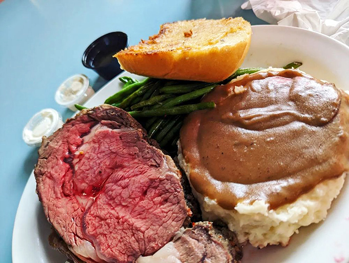 Prime rib that doesn't just melt in your mouth—it practically serenades it. Paired with those mashed potatoes, it's comfort food royalty.