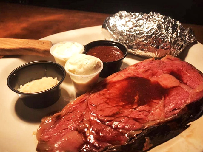 Prime rib that would make John Wayne weep with joy—perfectly pink, impossibly tender, and served with all the fixings a carnivore could desire.