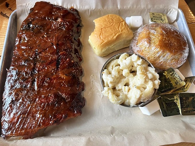 These ribs don't just fall off the bone—they practically leap onto your fork, trailing a wake of sticky, glorious sauce.