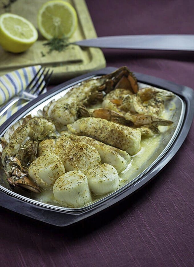 These buttery scallops aren't just seafood—they're little ocean jewels that make you wonder why you ever wasted stomach space on lesser appetizers.