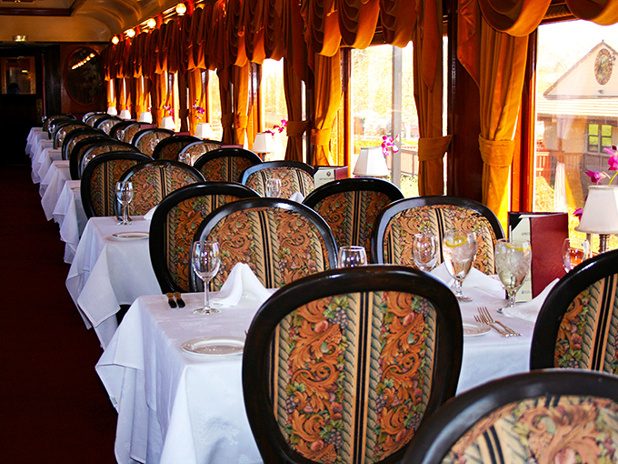 Plush chairs line this rolling parlor car, where passengers can sink into comfort while vineyards roll by like a living wine label come to life.