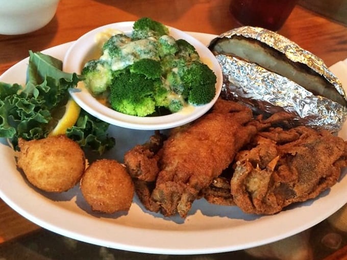 Soft-shell crabs, hushpuppies, and broccoli with cheese—the holy trinity of Chesapeake comfort. That baked potato in foil looks like it's wearing a tiny space suit.