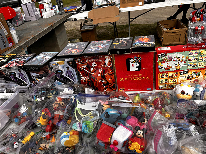 Board games and bagged treasures await their forever homes. Scattergories, anyone? These plastic-wrapped memories are priced to move.