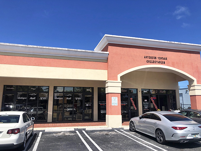 The coral-colored facade of Antique Mall Y'All brings a touch of Miami chic to vintage shopping.