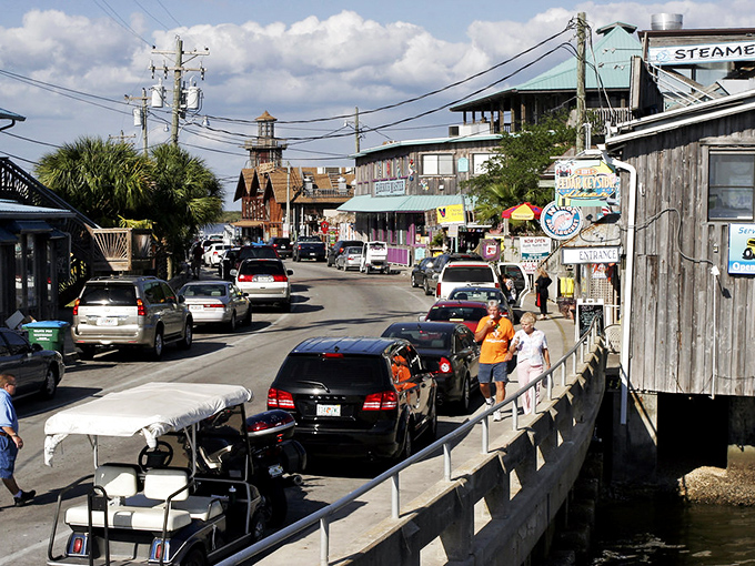 Cedar Key's main street has that "everybody knows your name" vibe, where golf carts outnumber SUVs and nobody's in a hurry.