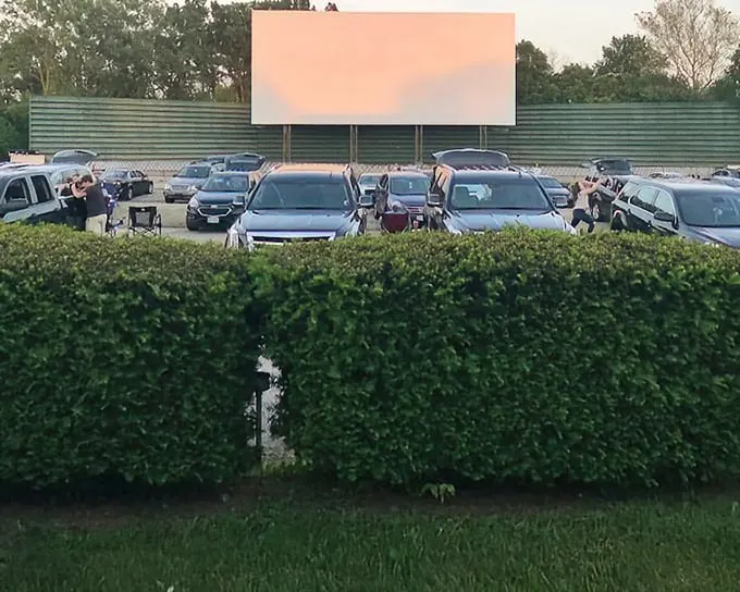 Melody 49 Drive-In's screen stands tall against the evening sky—a monument to simpler entertainment that somehow feels more meaningful today.