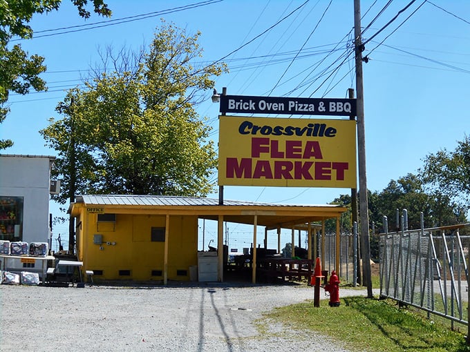 Small but mighty! The cheerful yellow Crossville Flea Market sign welcomes visitors to this local favorite.