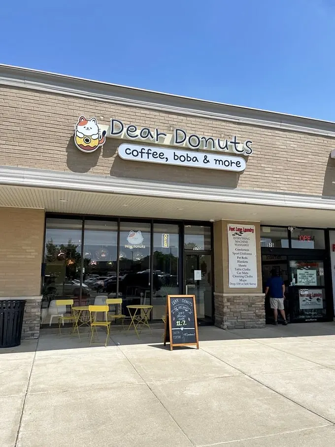 Dear Donuts' adorable cat logo is almost as sweet as their treats. Those cheerful yellow tables practically demand you sit and savor every bite!