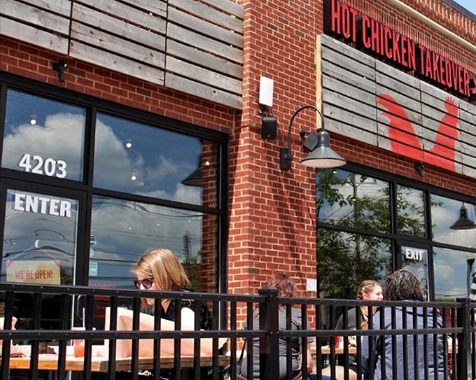 The outdoor seating at Hot Chicken Takeover offers the perfect spot to cool down between bites of their fiery, flavor-packed chicken.