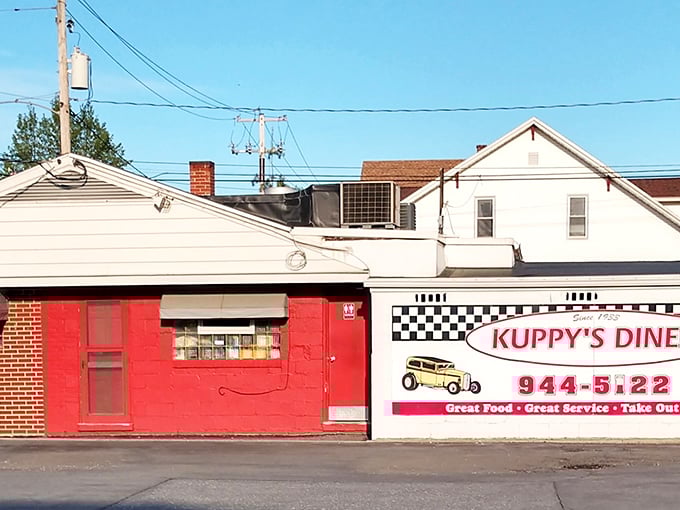 Kuppy's split personality facade—half brick red, half diner white—hints at the no-nonsense, all-delicious experience waiting inside.