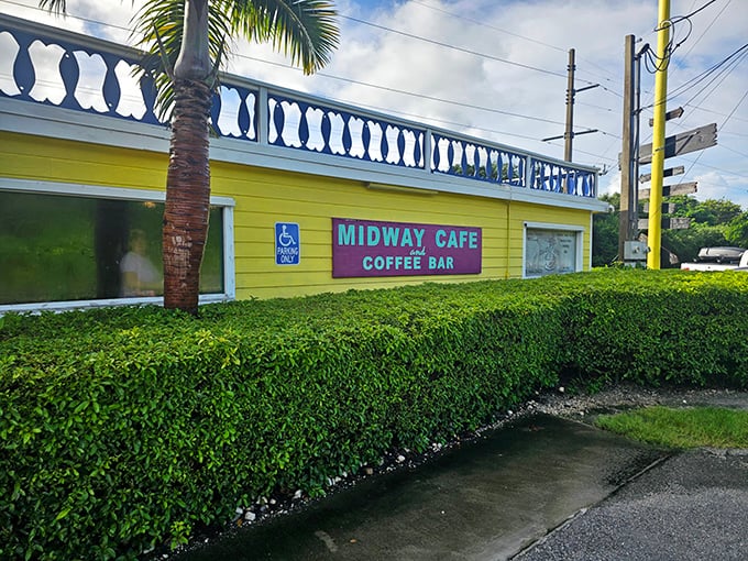 The Midway Cafe's sunny yellow exterior is like a beacon of hope for caffeine-deprived travelers on the Overseas Highway.