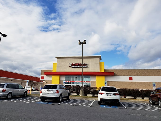 Ollie's bold yellow and red facade stands out like a carnival barker promising "Good Stuff Cheap!"