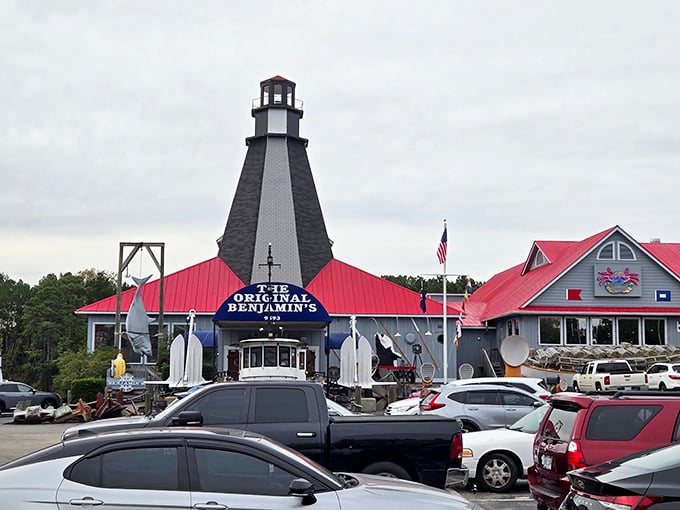 The lighthouse beckons hungry travelers! Benjamin's stands like a seafood beacon, promising treasures of the deep within.