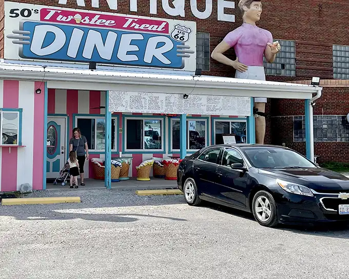 The Pink Elephant's 50's diner entrance is so authentically retro, you'll check your phone to make sure it's still 2023.