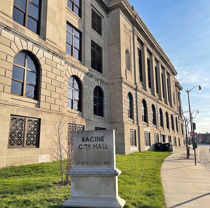 Racine City Hall stands proud as a courthouse wedding cake, all limestone layers and civic dignity.