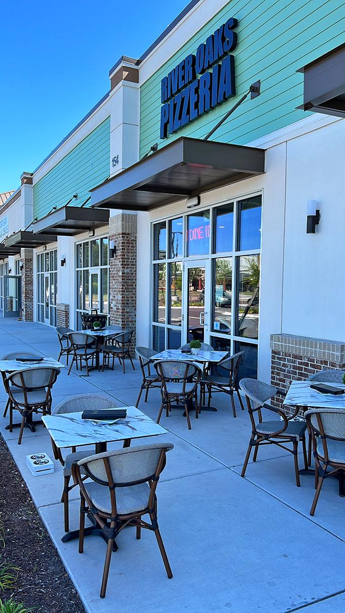 River Oaks' outdoor tables invite you to enjoy pizza al fresco—because somehow fresh air makes those perfect slices taste even better.