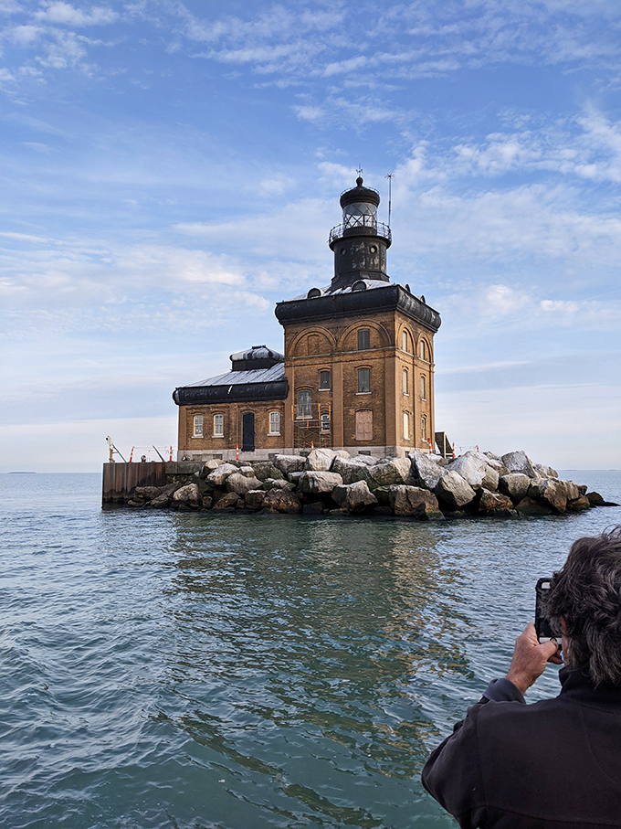 Toledo Harbor Lighthouse looks like someone dropped a brick mansion into Lake Erie. Now that's a commute!