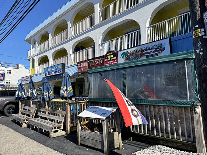 Woody's might be tucked under a hotel, but that blue awning leads to crab cake heaven that locals queue up for.