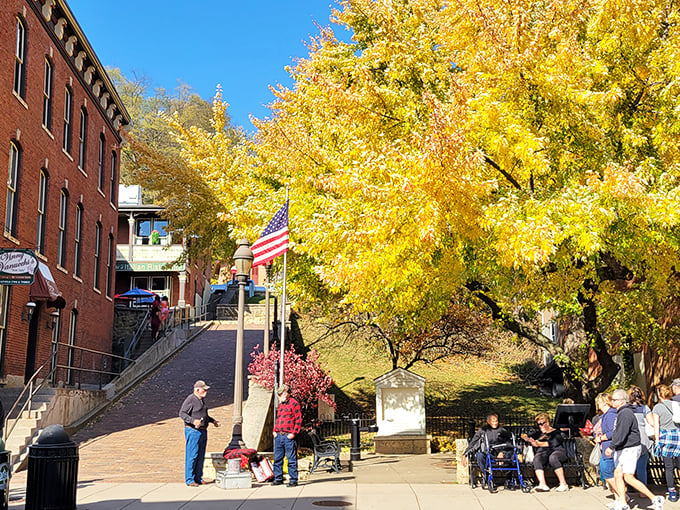 The vibrant hues of fall transform Galena's historic steps into a golden pathway, inviting visitors to explore what lies beyond.