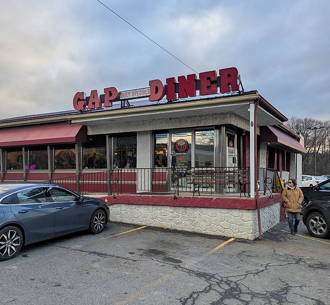 Red awnings and stone walls frame this temple of comfort food. The Gap Diner doesn't just fill stomachs—it fills the soul with pancakes wider than your plate.