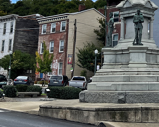 Sunlight bathes Pottsville's historic buildings in golden warmth – much like how your Social Security check stretches in this affordable gem.