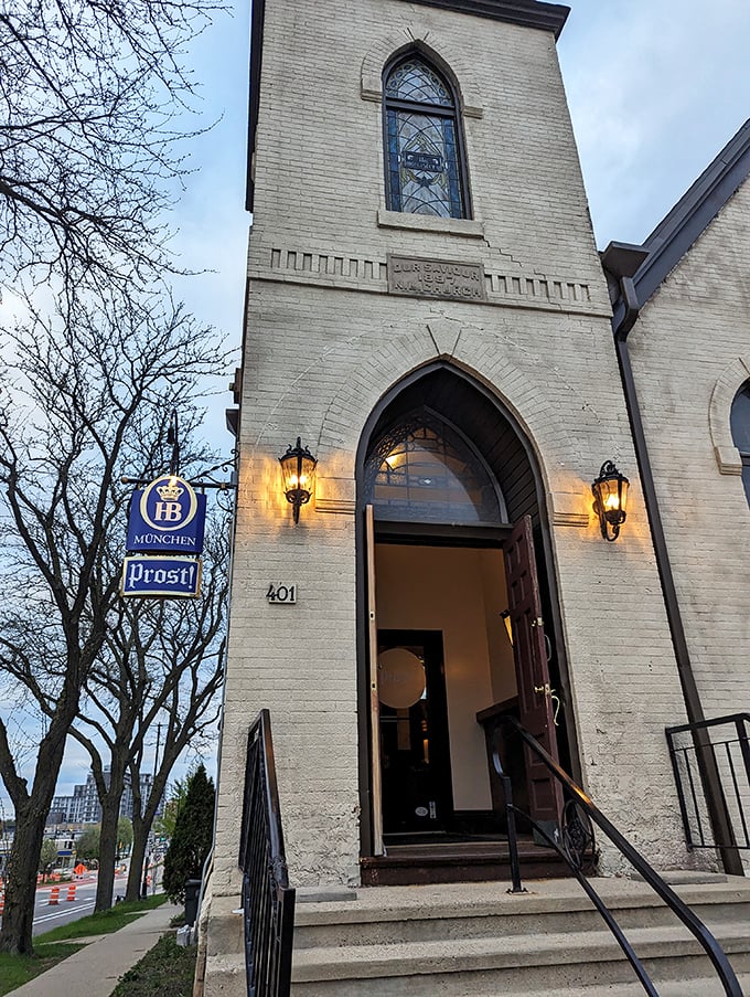 The former church that houses Prost! MSN stands tall against the Madison sky, promising salvation in the form of perfectly poured pilsners.