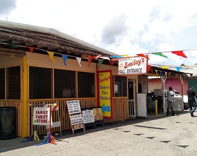 Colorful banners and cheerful signage at Smiley's entrance—like a carnival for your shopping senses where every booth offers a new surprise.