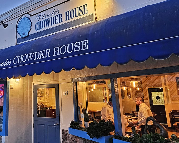 As evening falls, Vivolo's Chowder House glows with promise—each window framing the seafood happiness happening inside.