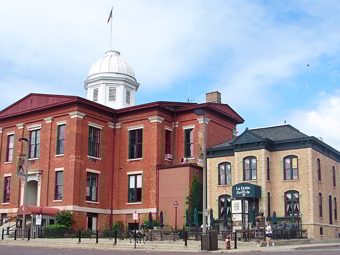 That distinctive red-trimmed Opera House in Woodstock has more personality than most modern buildings could dream of having.