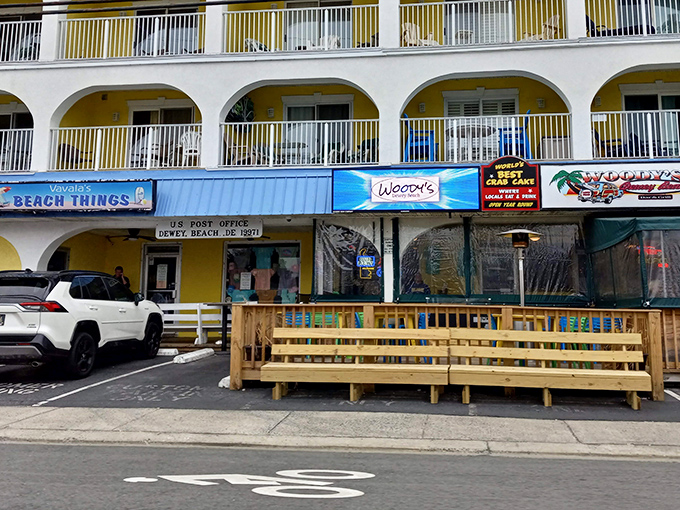 Don't let the modest storefront fool you—Woody's serves up crab cakes that could make a mermaid switch citizenship.
