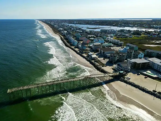 Carolina Beach from above reveals the perfect marriage of civilization and wilderness—like finding a five-star restaurant in your favorite hiking spot.