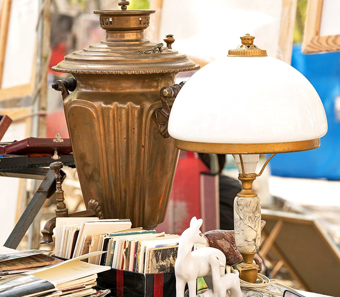 Vintage meets whimsy in the collectibles section, where brass samovars and marble-based lamps tell stories of elegant dinner parties from decades past.