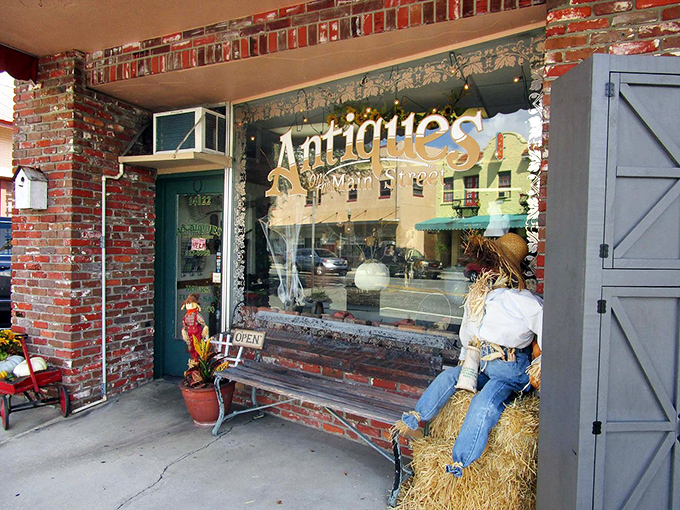 That scarecrow isn't just guarding antiques—he's waiting for you to discover the vintage treasure you never knew you needed until this very moment.