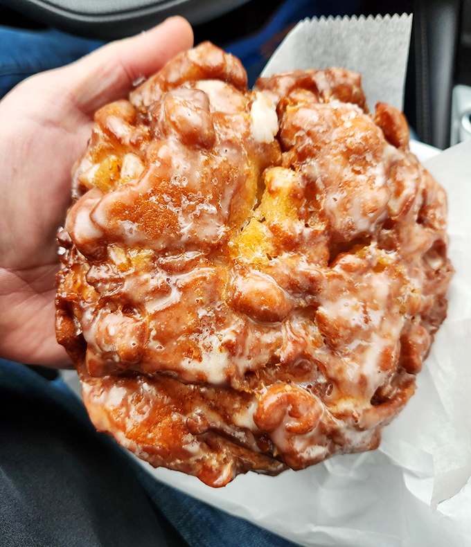 The legendary apple fritter – a craggy landscape of caramelized apples and glaze. It's not a pastry; it's a geological marvel that happens to be delicious.