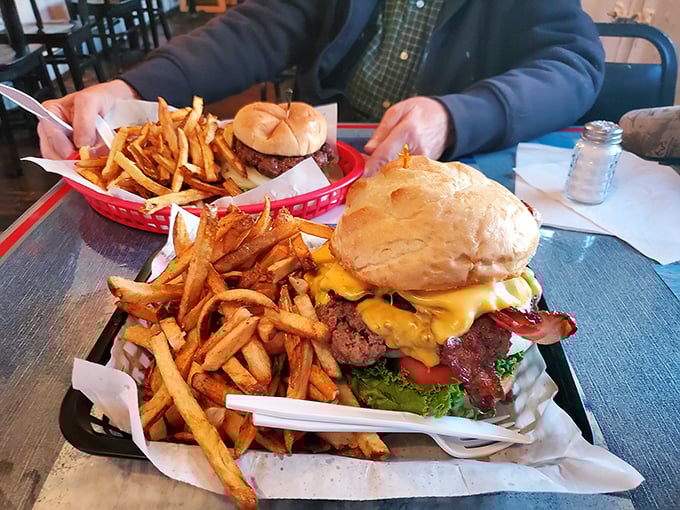 This isn't just a bacon cheeseburger—it's a monument to American excess that somehow makes you feel patriotic just looking at it.