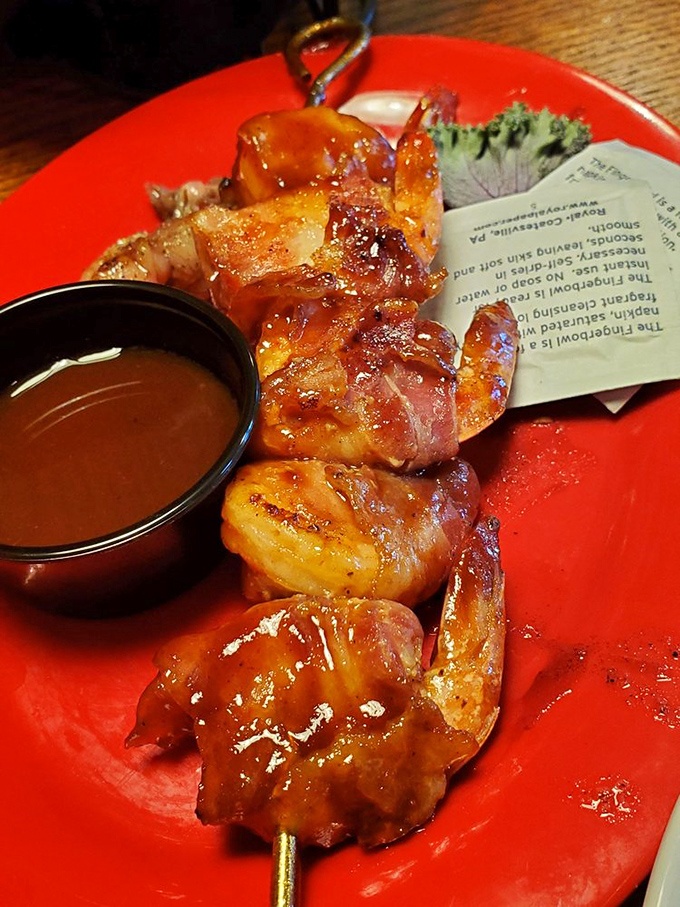 Bacon-wrapped shrimp: Because the only way to improve jumbo shrimp is to dress them in nature's candy. Sweet meets savory in this appetizer masterpiece.