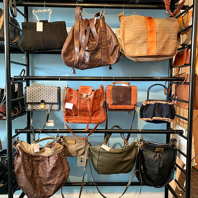 Purse paradise organized like a high-end boutique – because even secondhand deserves the royal treatment here.