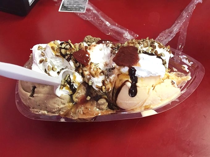 This isn't just a sundae—it's architecture. A towering monument to the art of ice cream, whipped cream, and all things holy in dessert form.