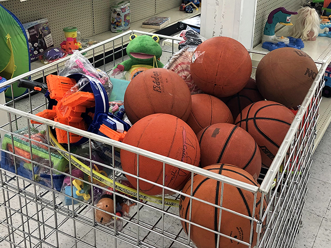 A bin of basketballs waiting for their second shot at glory—proof that even Michael Jordan's favorite toy deserves an encore performance.