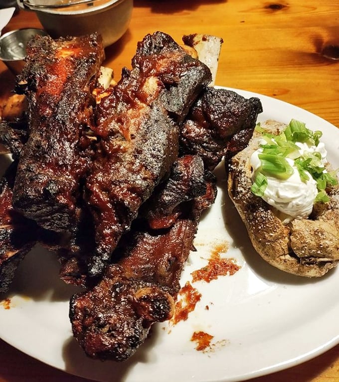 These beef ribs look like they came from a brontosaurus—gloriously charred, sticky-sweet, and requiring both hands and zero shame.