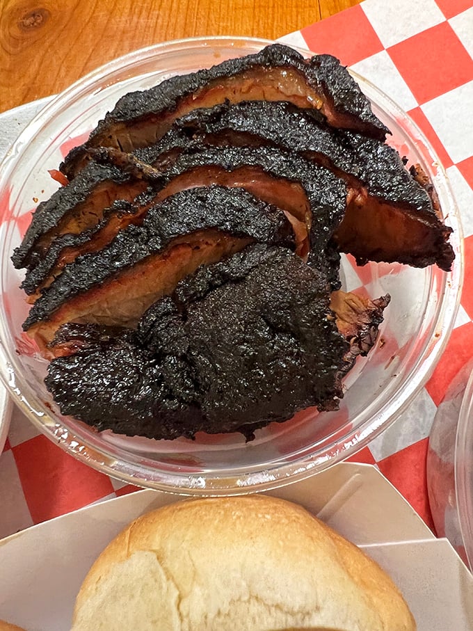 That bark! That smoke ring! Brisket with the kind of crust that makes you forget your table manners and reach for seconds.