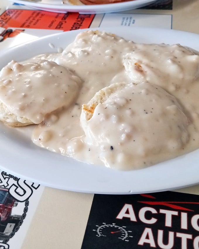 These biscuits aren't just smothered in gravy—they're embraced by it, a comforting hug on a plate that whispers, "Good morning, indeed."