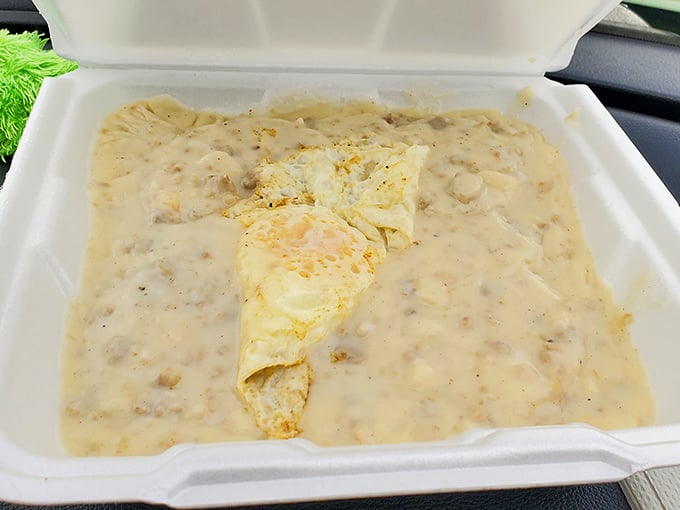 Biscuits swimming in creamy sausage gravy – the breakfast equivalent of a warm hug from your favorite grandma on a cold Indiana morning.
