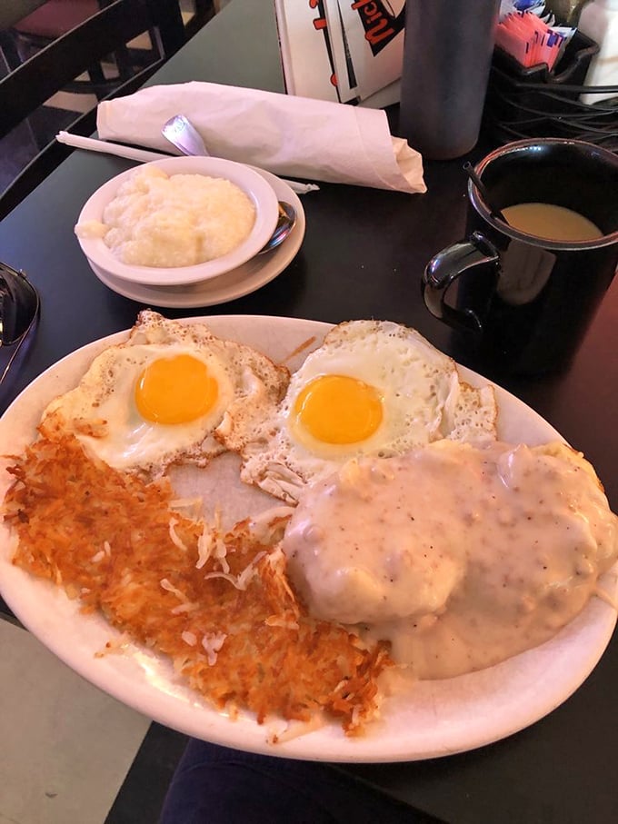 Sunny-side up eggs and creamy gravy—breakfast's perfect power couple. The hash browns are crispy enough to make a satisfying crunch heard 'round the diner.